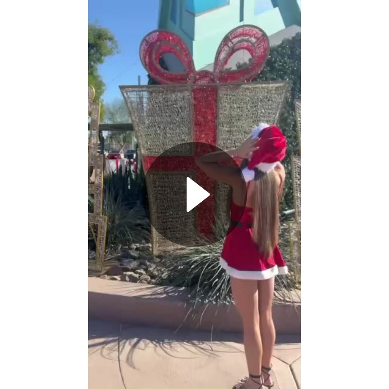 Skylar Mae's Festive Santa Outfit & Giant Elf Climbing Stunt | Video by ...